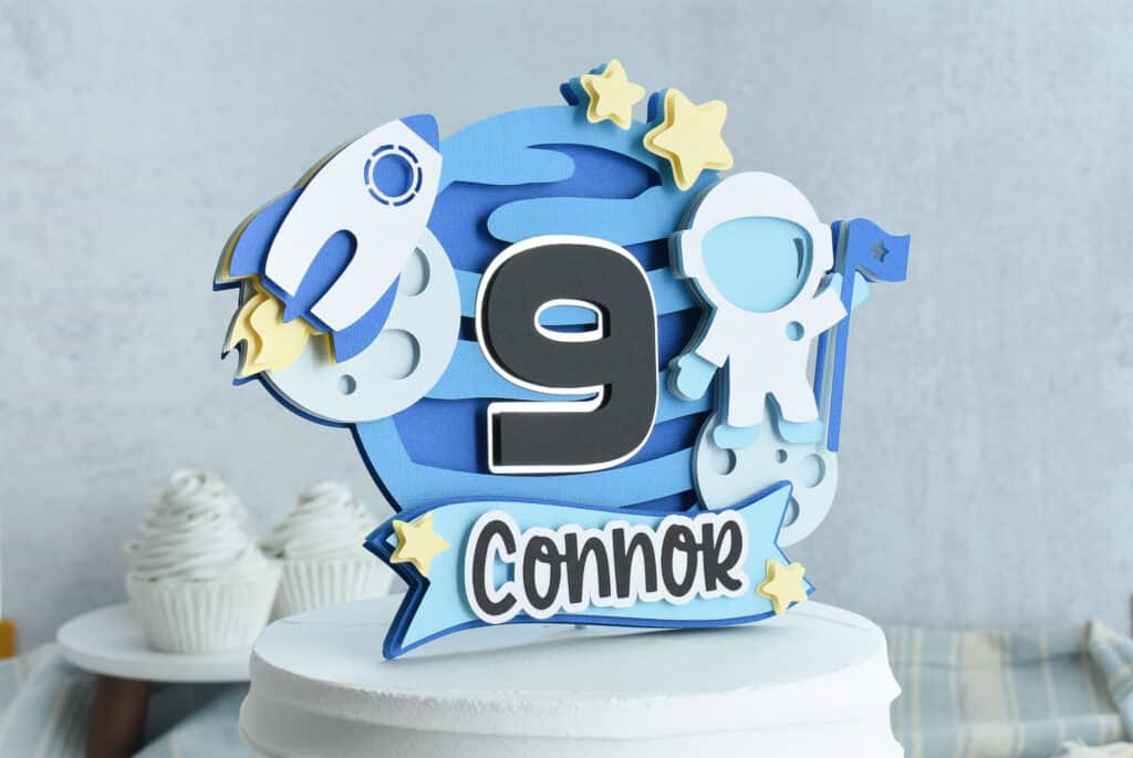 Outer Space Birthday Cake topper with Cricut | FREE SVG - Craftara Creates